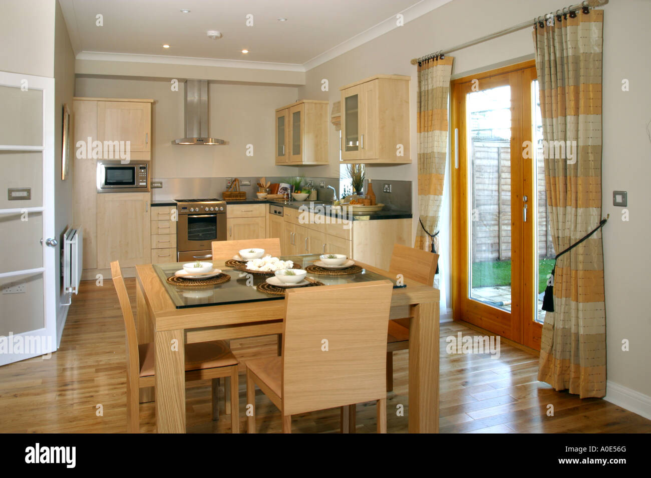 Kitchen dining room show house hi-res stock photography and images - Alamy