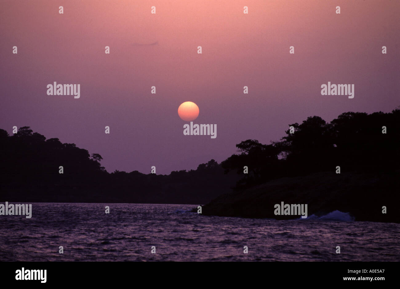 Turkey. Mediterranean. Bay of Fethiye. Sunset between hills Stock Photo ...