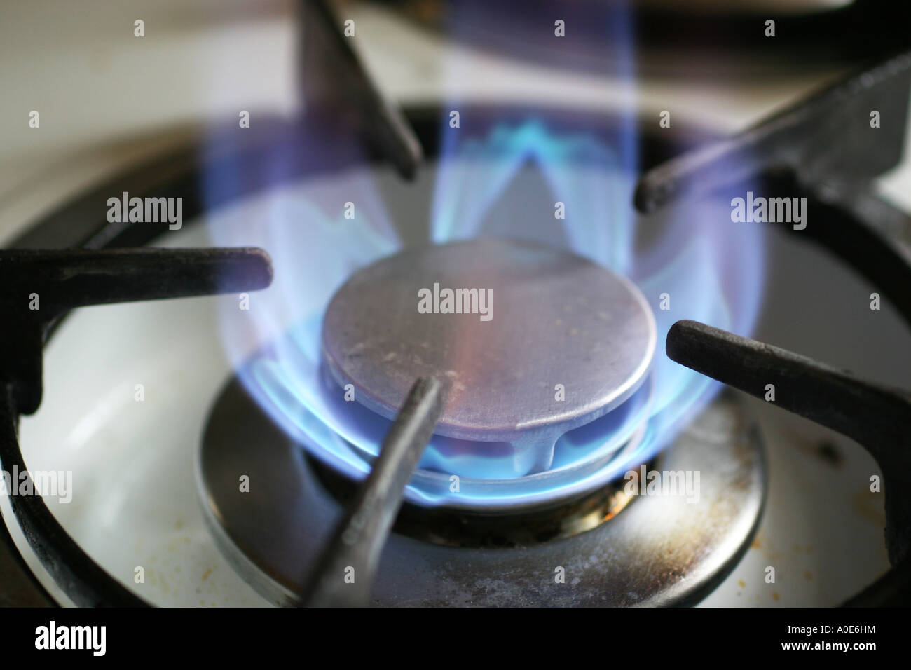 Burning town gas on a hob in a domestic kitchen Stock Photo - Alamy
