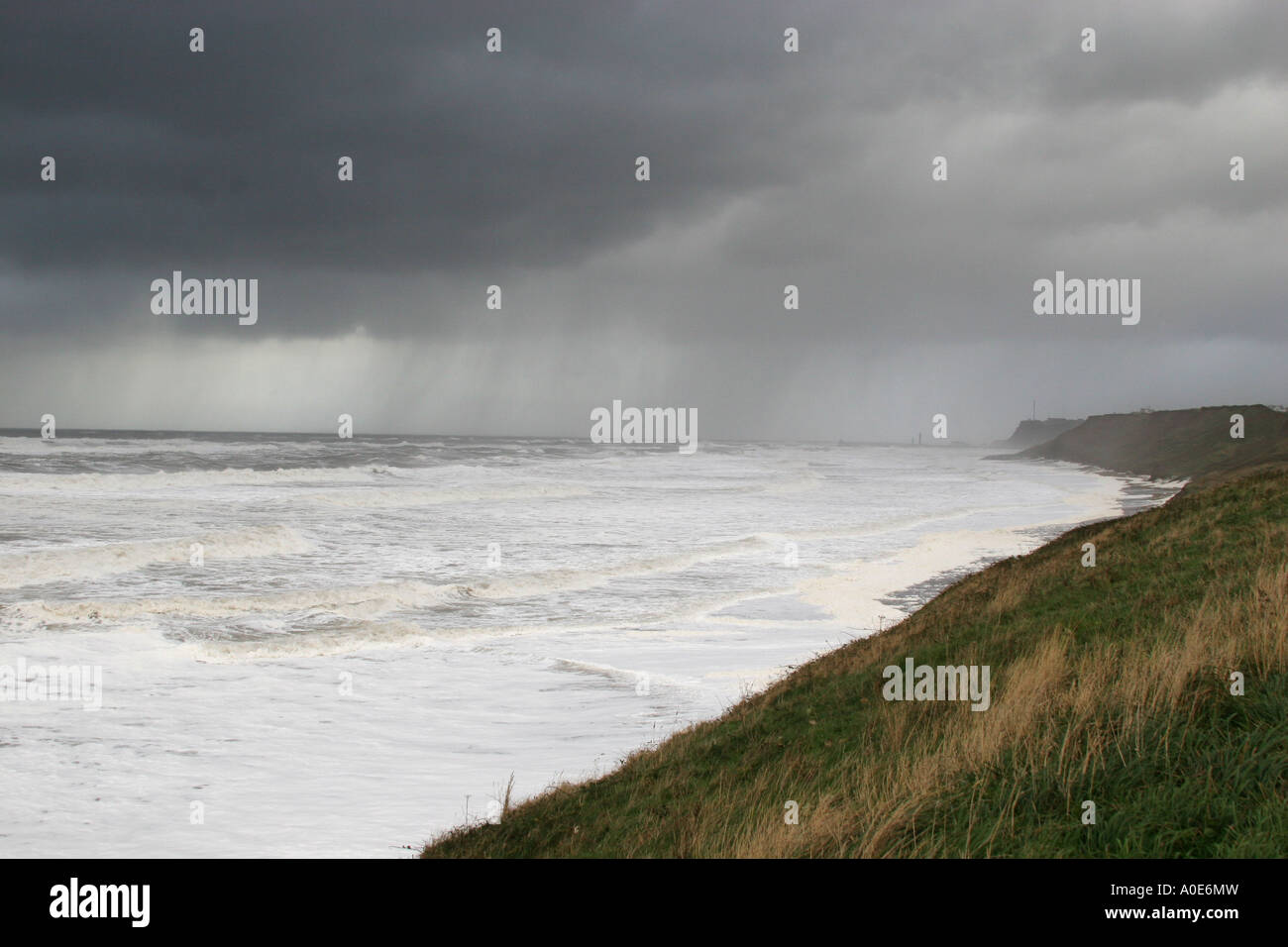 Rain clouds and rain falling over the North Sea near Whitby Stock Photo ...