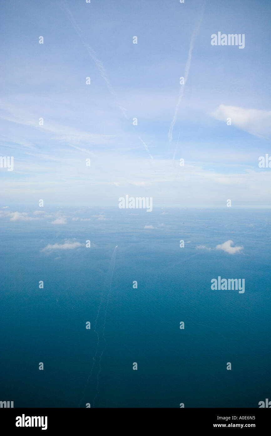 Commercial airliner jet trails formation hi-res stock photography and ...