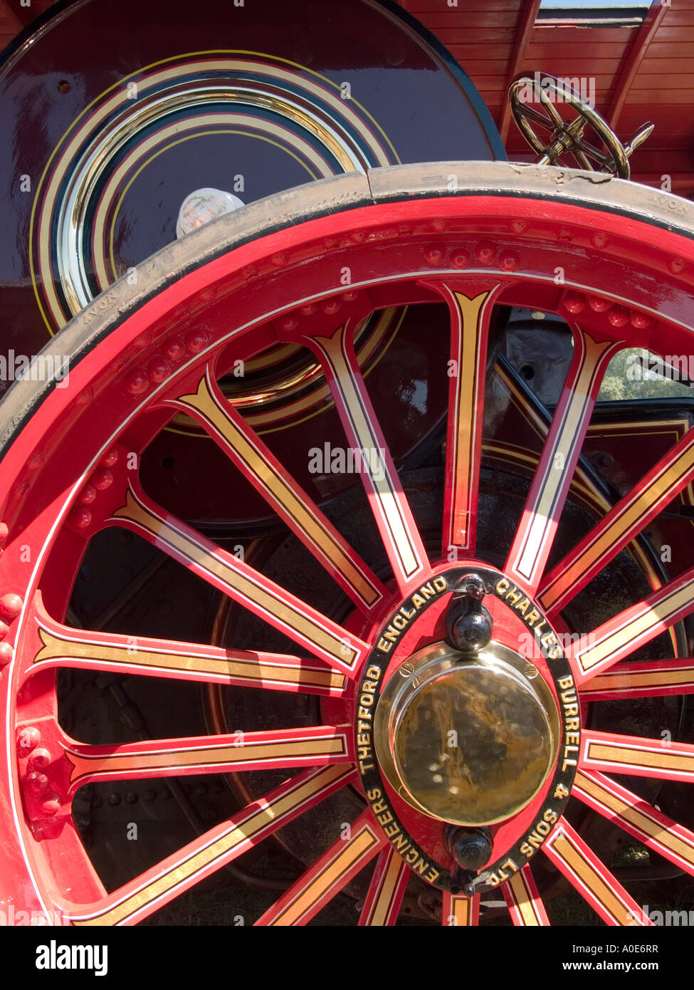Steam fair traction engine wheel red spokes bright hi-res stock ...