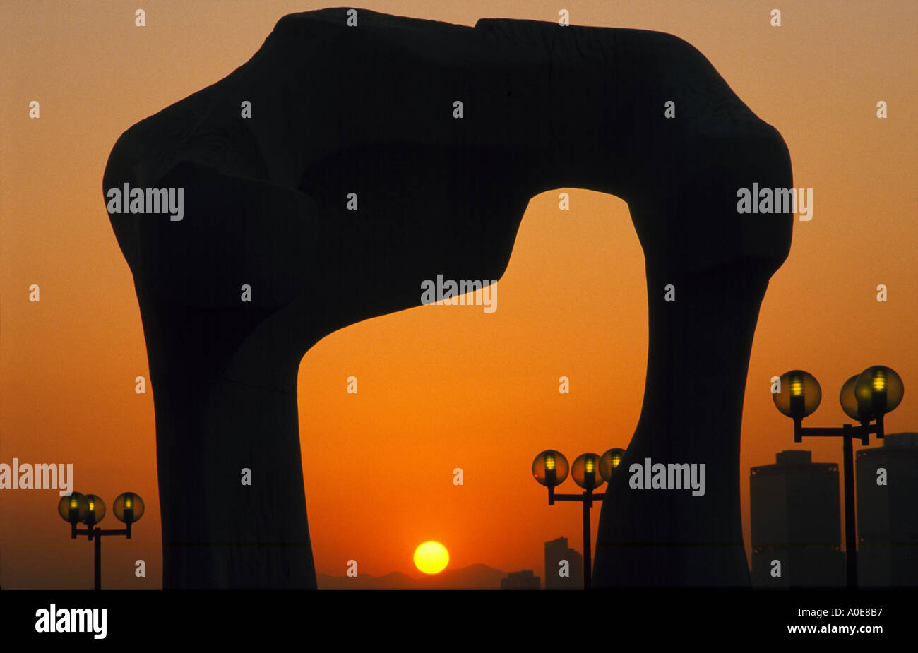 Sculpture at sunset Hong Kong Stock Photo - Alamy