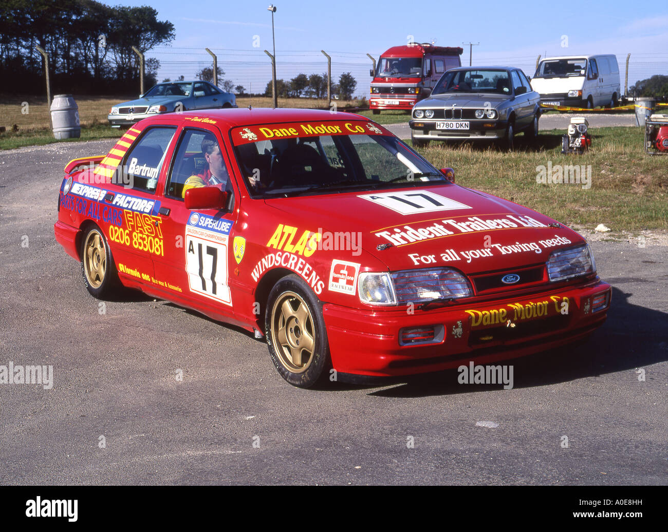 Red Cosworth Sapphire racing saloon at Cadwell Park Stock Photo - Alamy