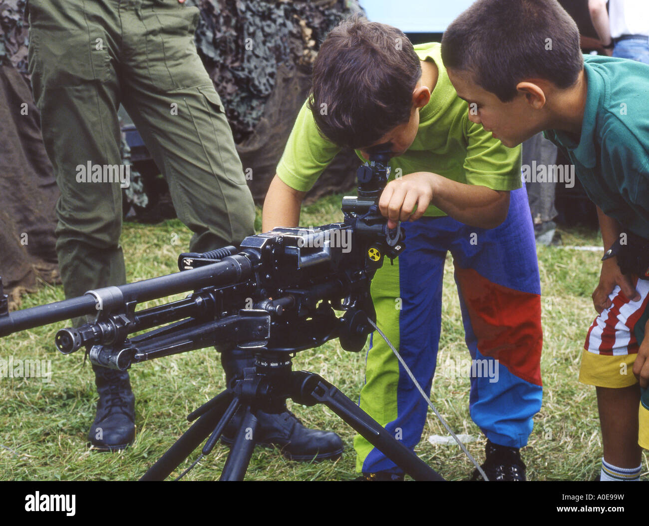 Young boys with general purpose machine gun at demonstration on army ...