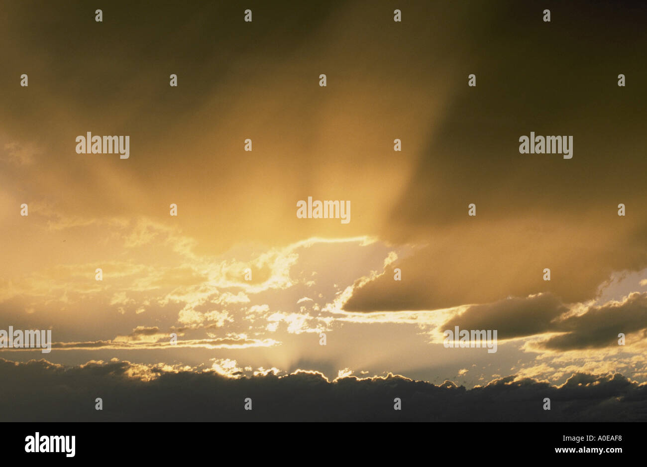 Sunset sunrise storm clouds and god or light rays Stock Photo - Alamy