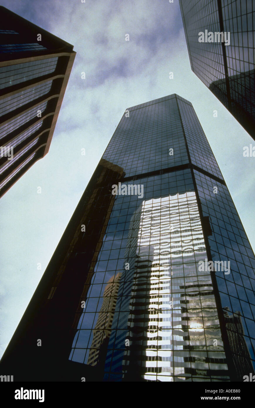 Looking up at skycraper buildings with reflections in windows Denver ...