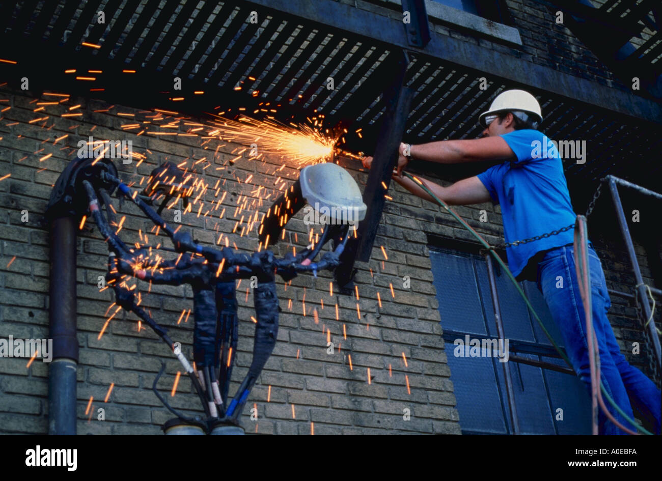 Worker uses acetylene torch Stock Photo - Alamy