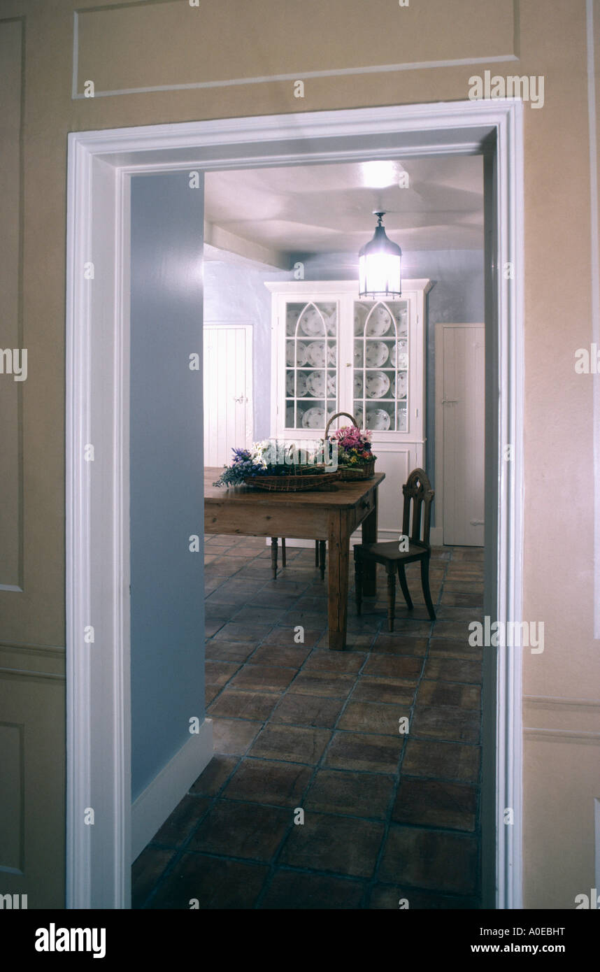 View through open door to traditional diningroom Stock Photo - Alamy