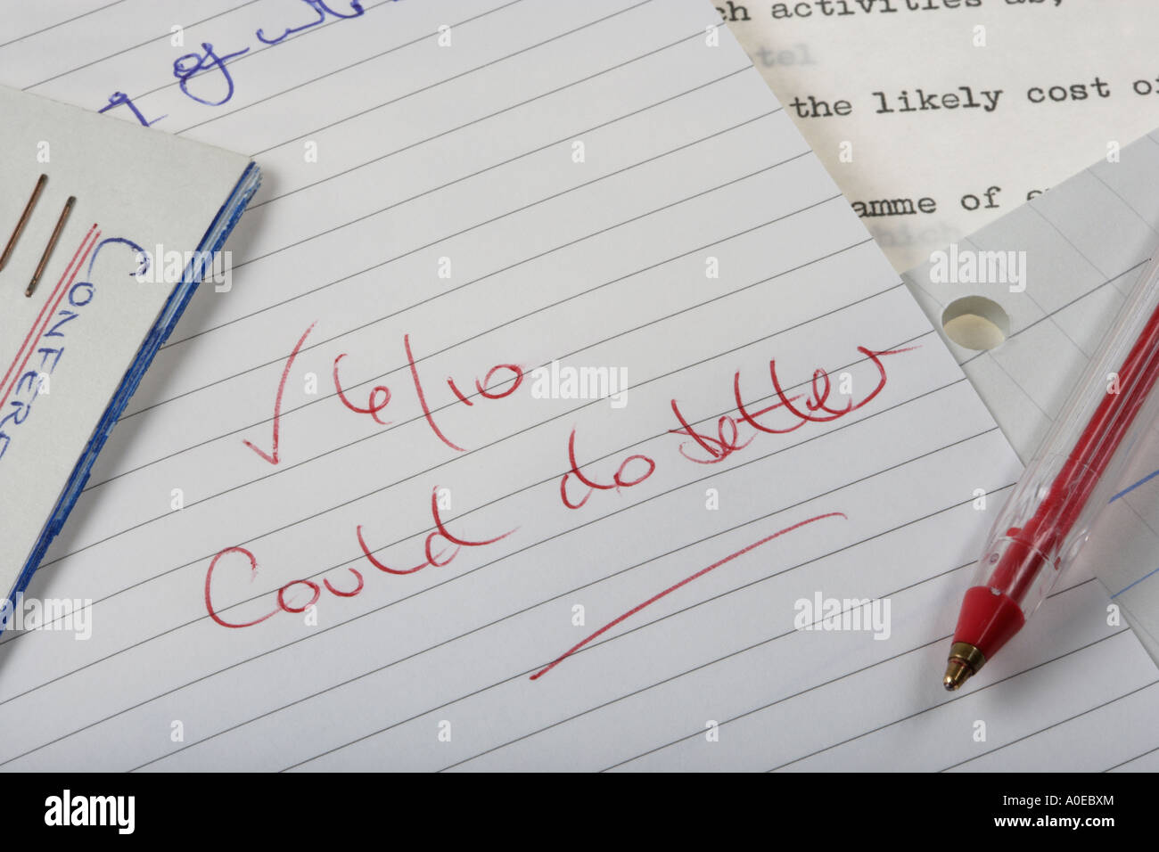Teachers comments on marked school work Stock Photo - Alamy