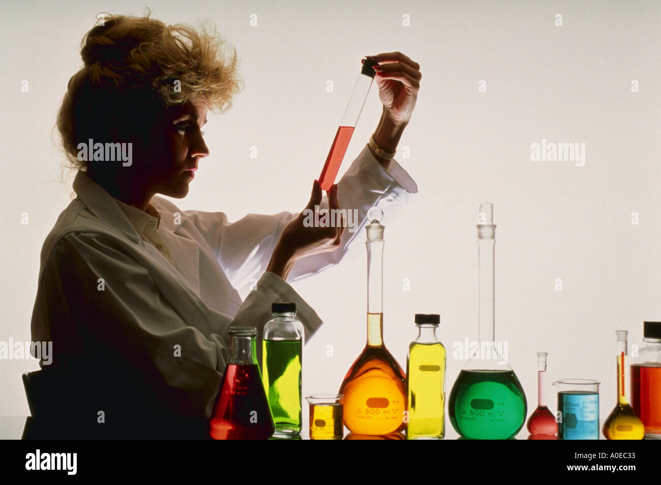Chemist with beakers MR Stock Photo - Alamy