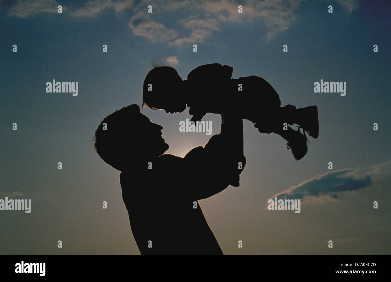 Father lifting baby in air hi-res stock photography and images - Alamy