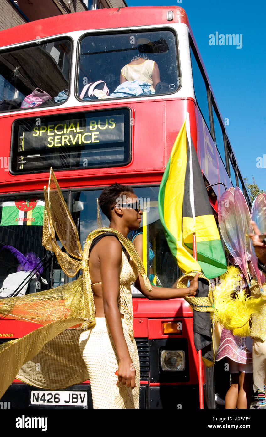 Red bus helps with transporting children who dance on the carnival ...