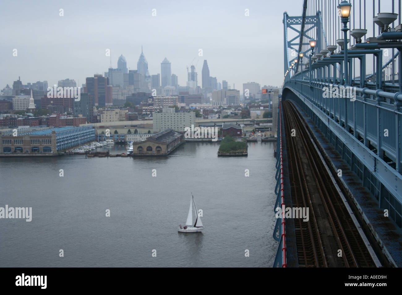 Philadelphia skyline and Benjamin Franklin Bridge across Delaware river ...