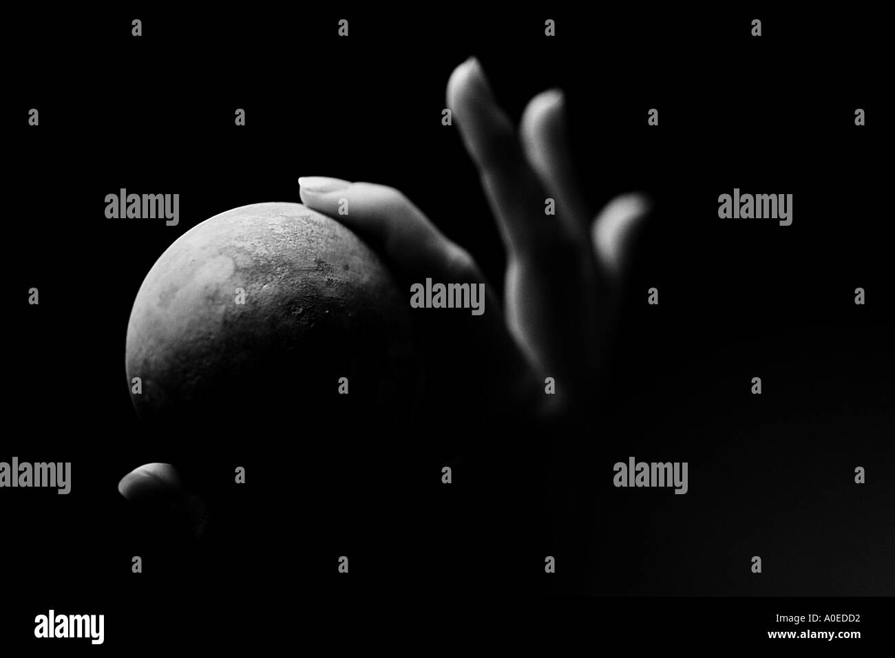 hand holding stone sphere Stock Photo - Alamy