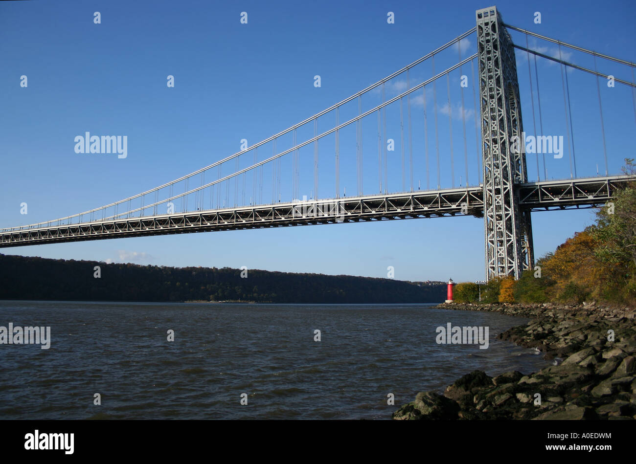Tower of George Washington Bridge, trees of Fort Washington Park and ...
