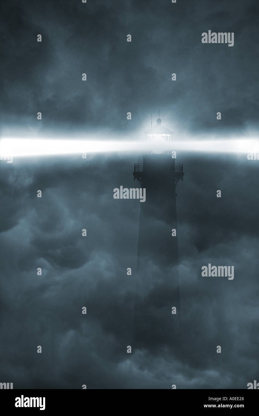 lighthouse in mist Stock Photo - Alamy