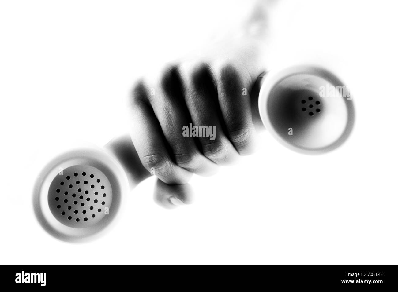 hand holding phone receiver Stock Photo - Alamy