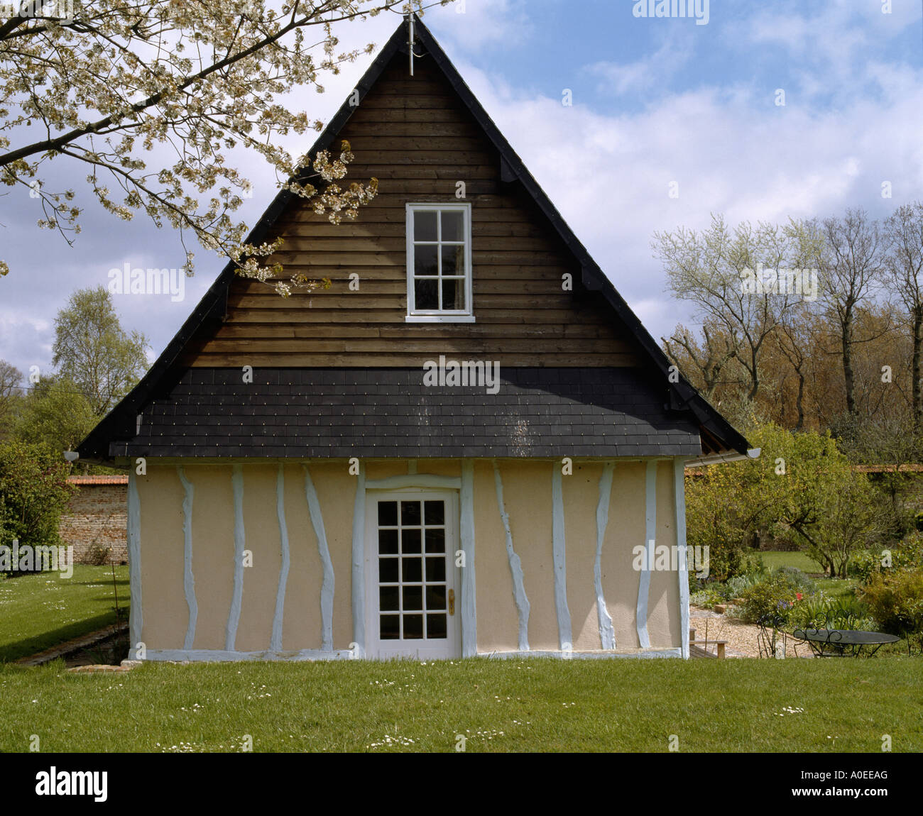 Traditional French cottage with painted walls Stock Photo - Alamy