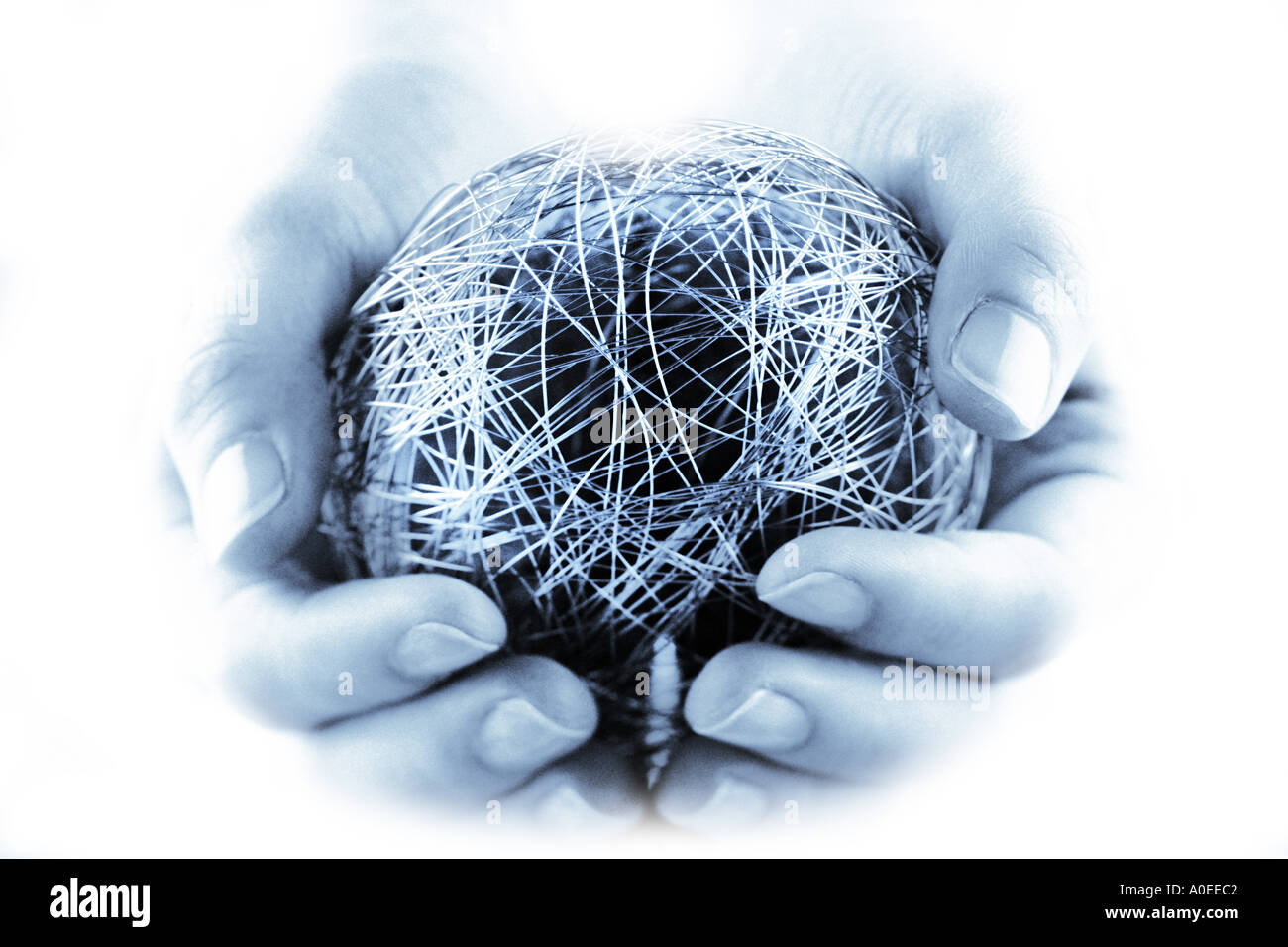 wire ball held in hands Stock Photo - Alamy