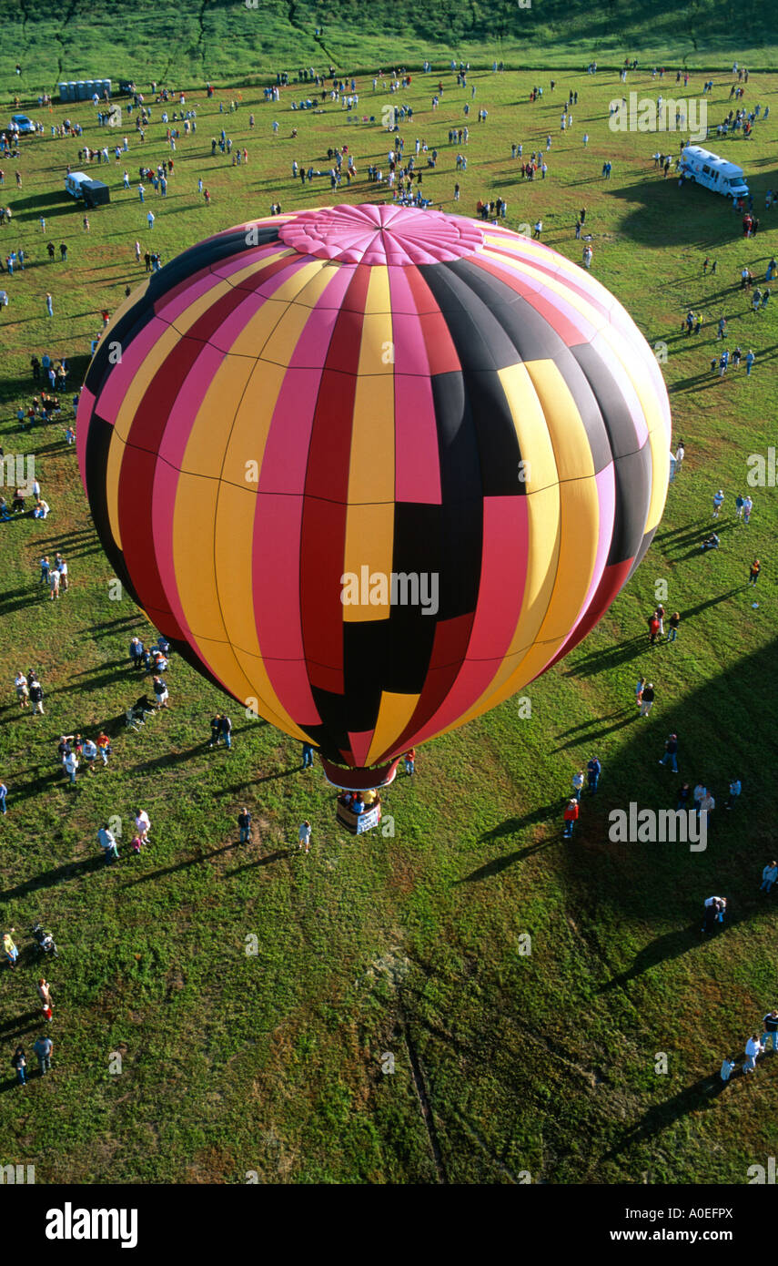 One balloon hovers over field at hot air balloon festival Steamboat ...