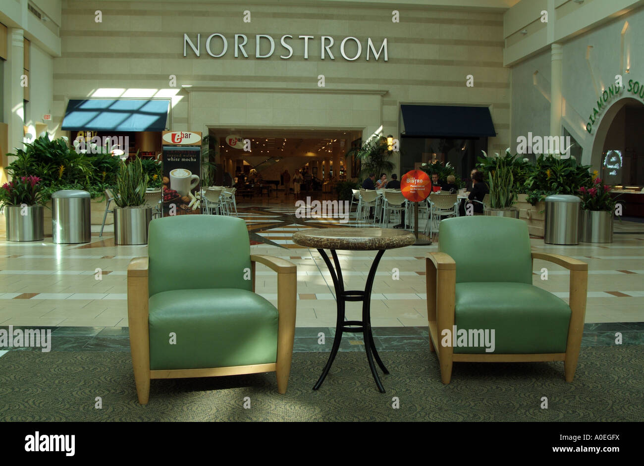 Easy chairs in shopping complex Comfortable upholstered armchairs and ...