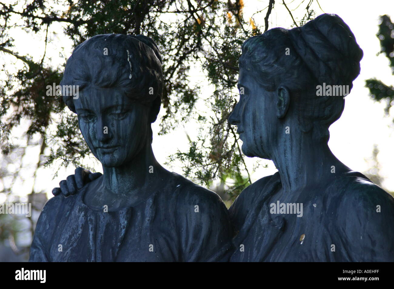 Two religious statues in graveyard hi-res stock photography and images ...