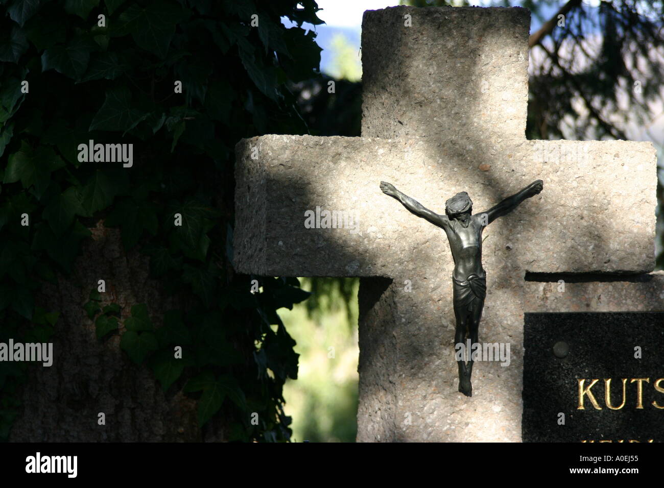 stone cross with Jesus Stock Photo - Alamy