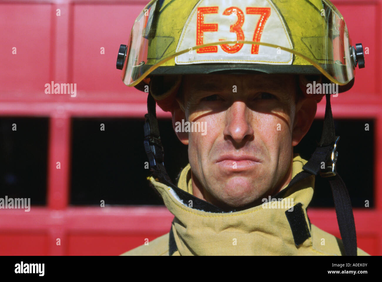 Portrait of frowning sad fireman Stock Photo - Alamy