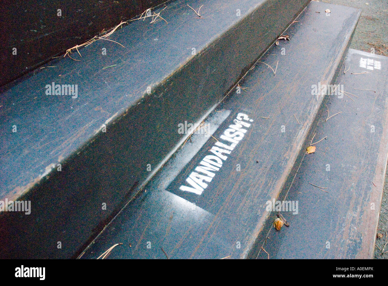 Word vandalism stencilled on a step Stock Photo - Alamy