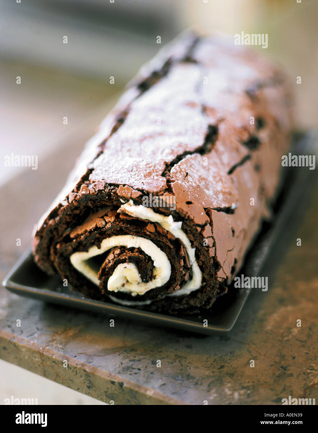 Chocolate roulade with fresh whipped cream Stock Photo - Alamy