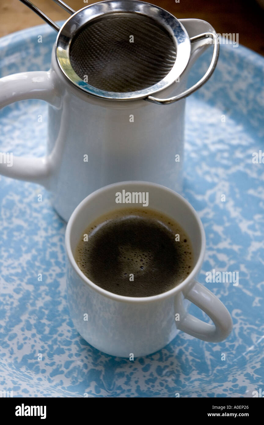 Real coffee made simply in jug with tea strainer instantly Stock Photo ...