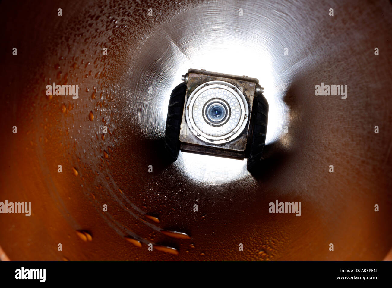 Remote controlled video camera in drainage pipe recording an internal ...