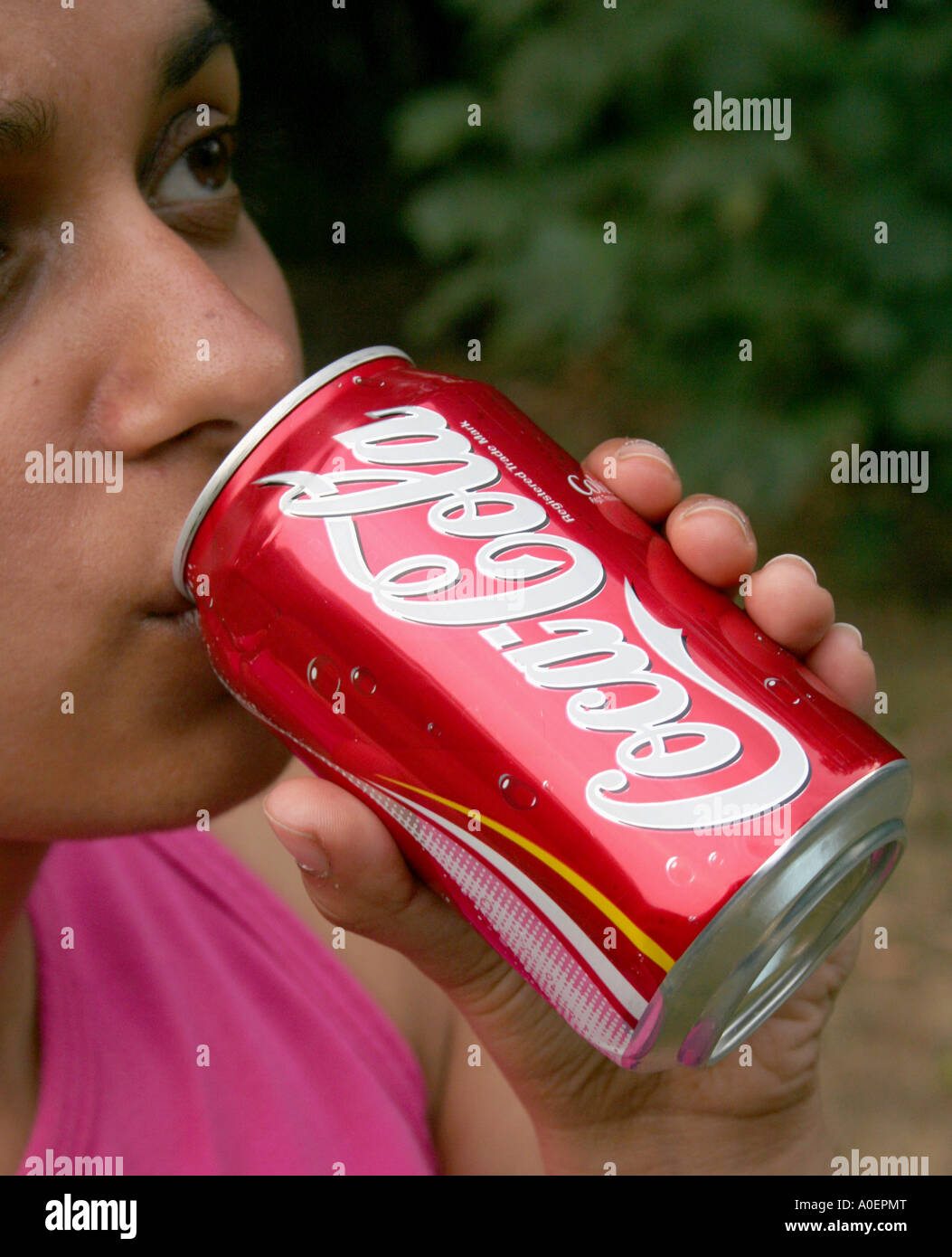 Women drinking coca cola hi-res stock photography and images - Alamy