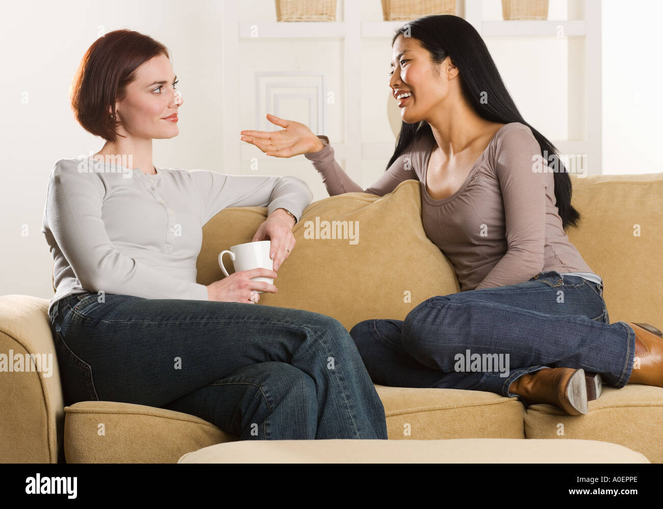 Woman friends talking Stock Photo - Alamy