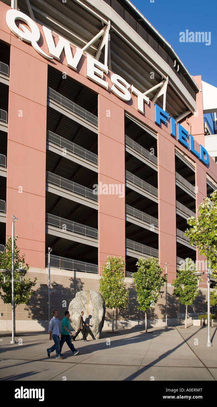 People walking to baseball match at Safeco Field past Qwest Field ...