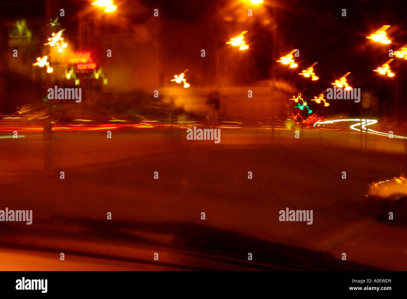 Urban night time street scene with light trails and camera shake Stock ...