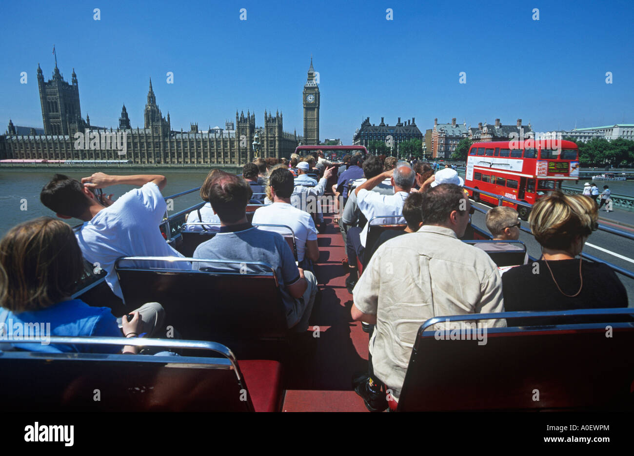 Tour bus Houses of Parliament London England Stock Photo - Alamy