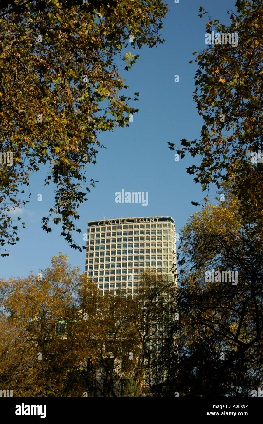 Distant view of Centre Point office tower through the Autumn trees of ...