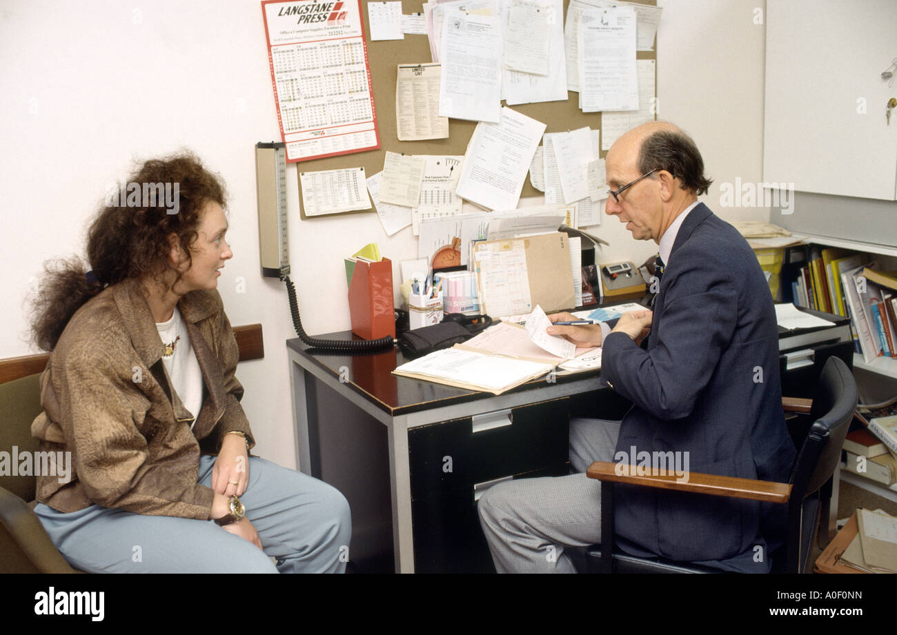 GP consulting a patient Stock Photo - Alamy