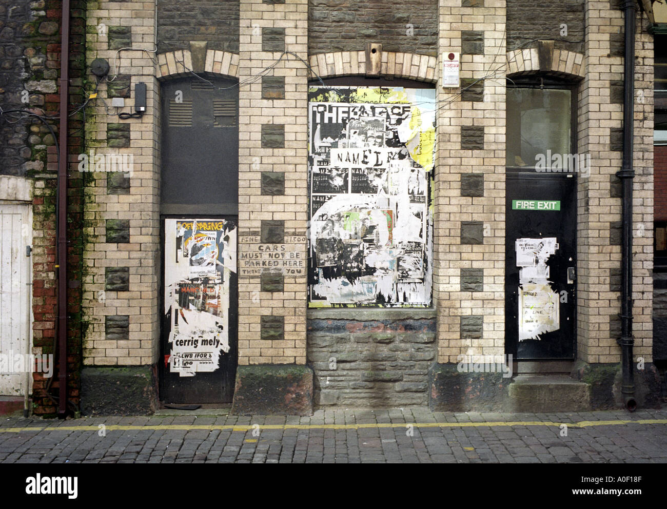 Old fly posters on wall of historical building Stock Photo - Alamy