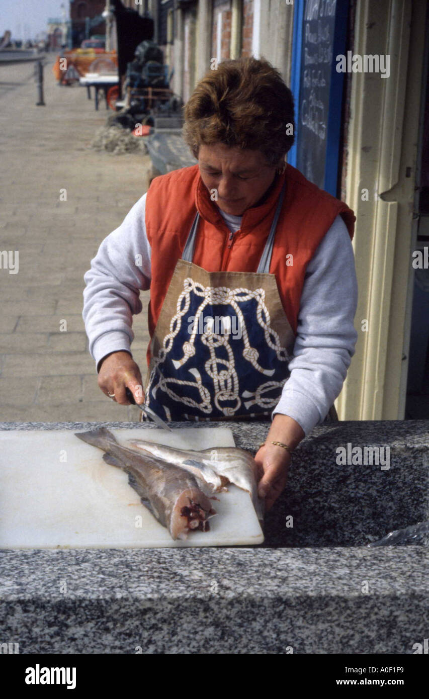 Woman gutting fish hi-res stock photography and images - Alamy
