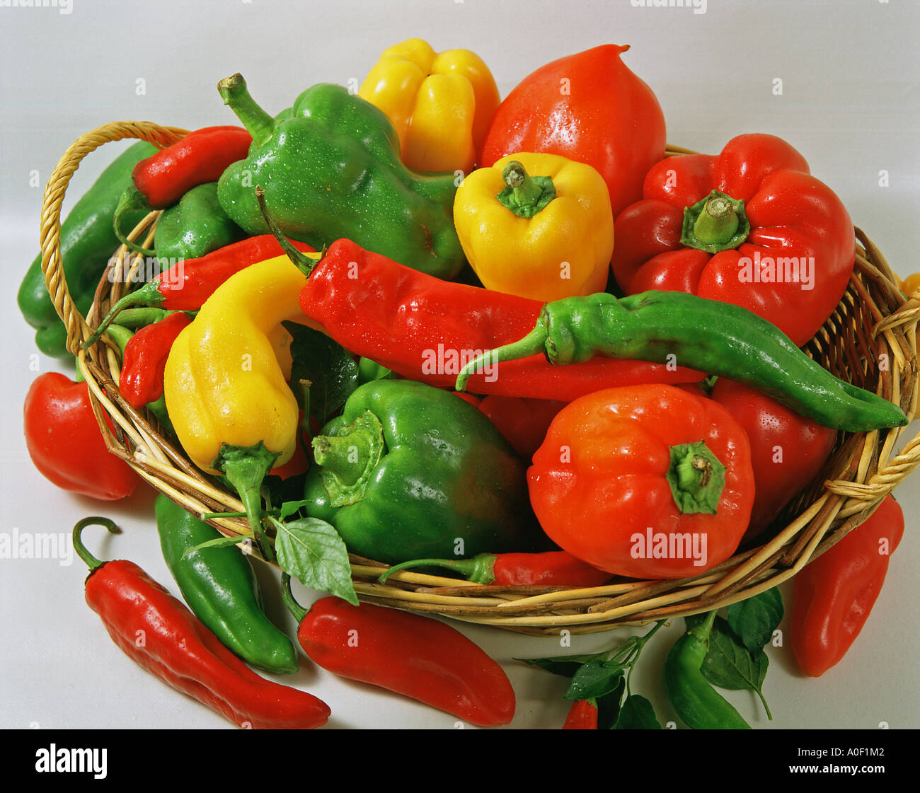 One red and many green peppers hi-res stock photography and images - Alamy