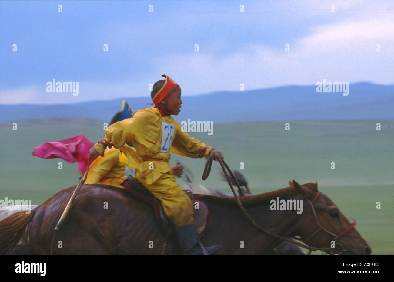 Boy riding horse Stock Photo - Alamy