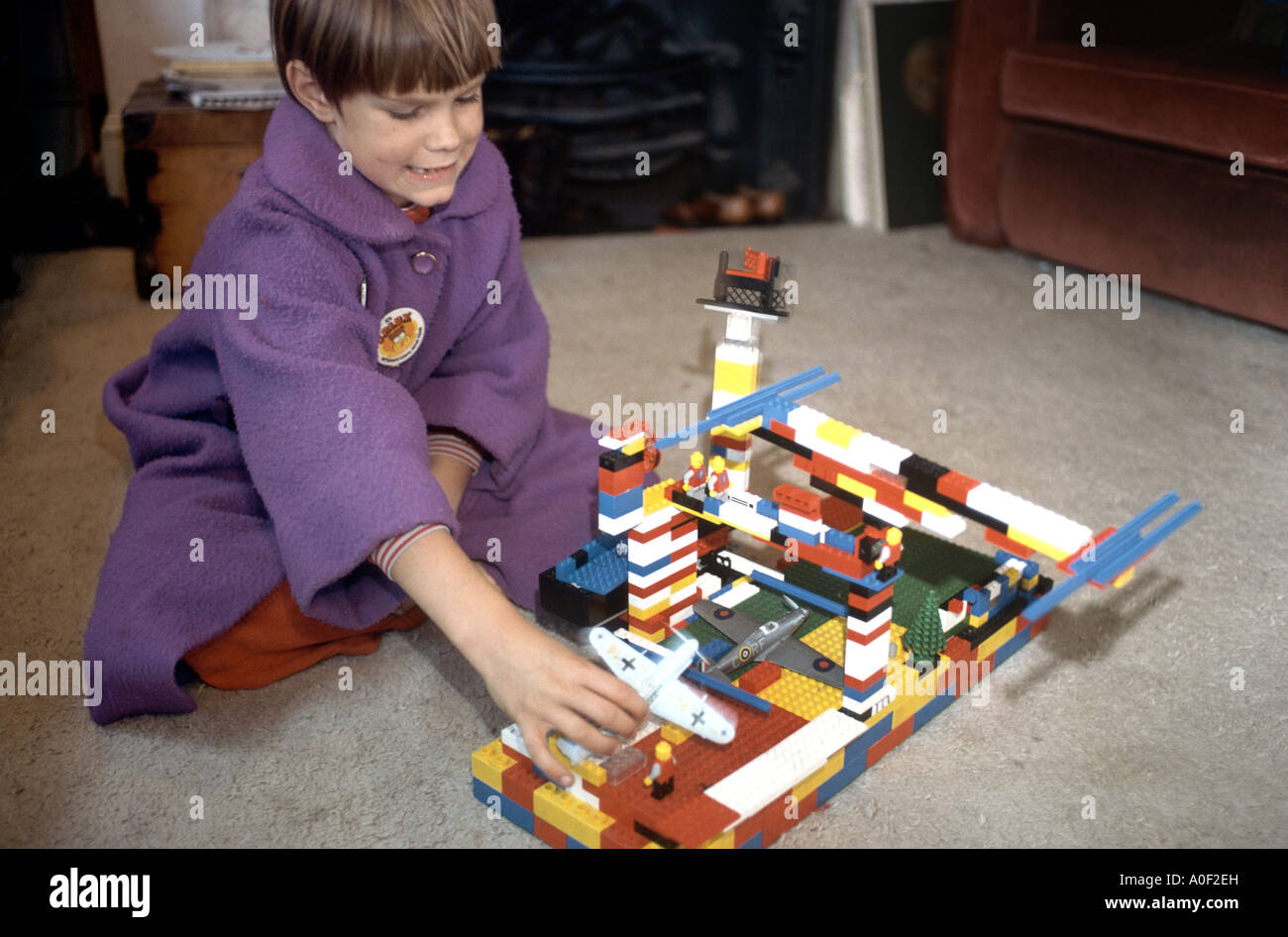 young boy playing with lego Stock Photo - Alamy