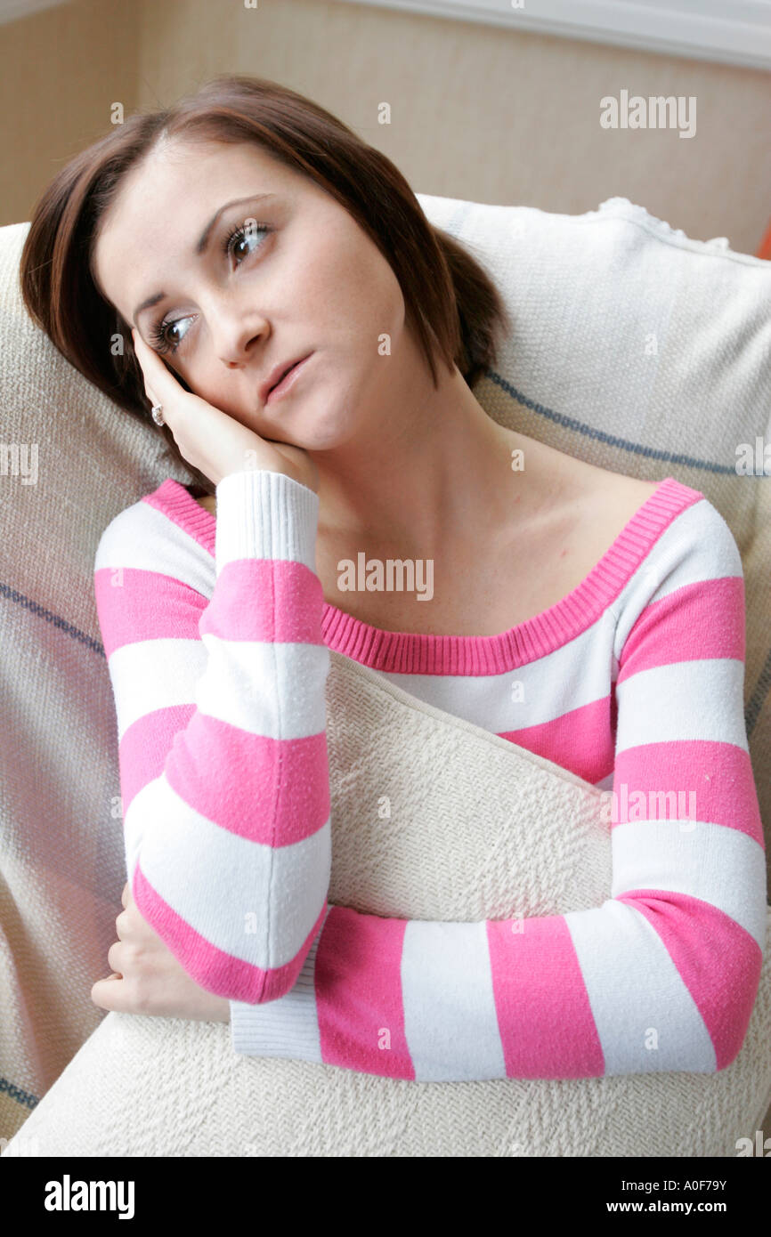 Unhappy brunette girl Stock Photo - Alamy