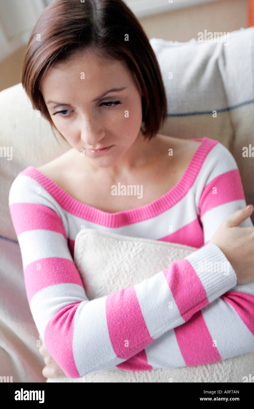 Unhappy brunette girl Stock Photo - Alamy