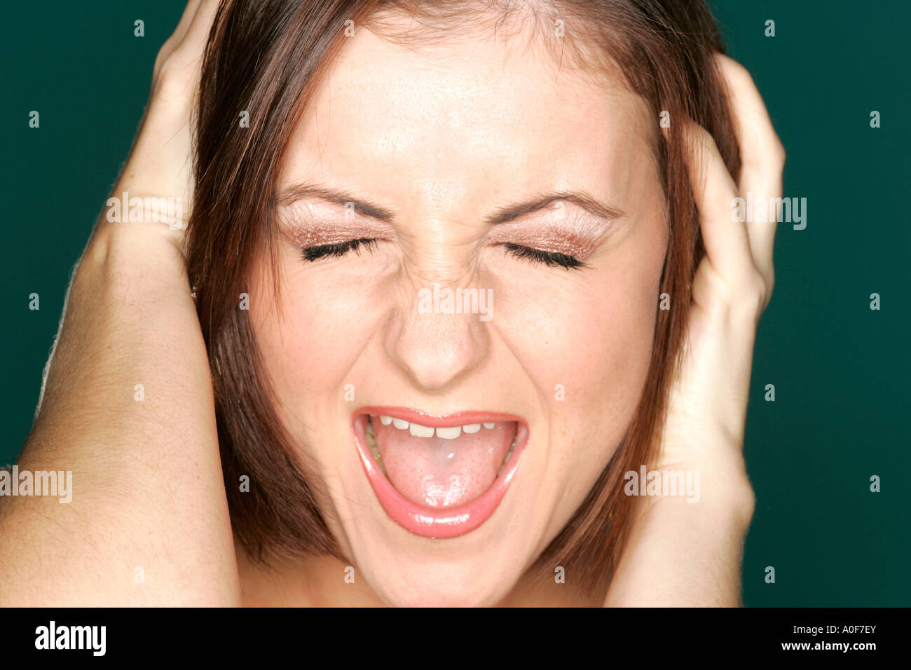Young girl screaming Stock Photo - Alamy