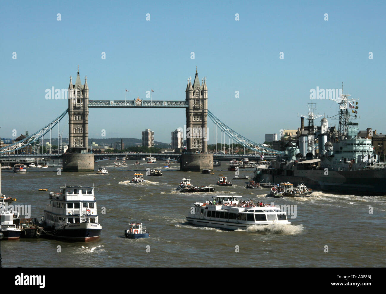 Tower Bridge with busy river traffic Stock Photo - Alamy