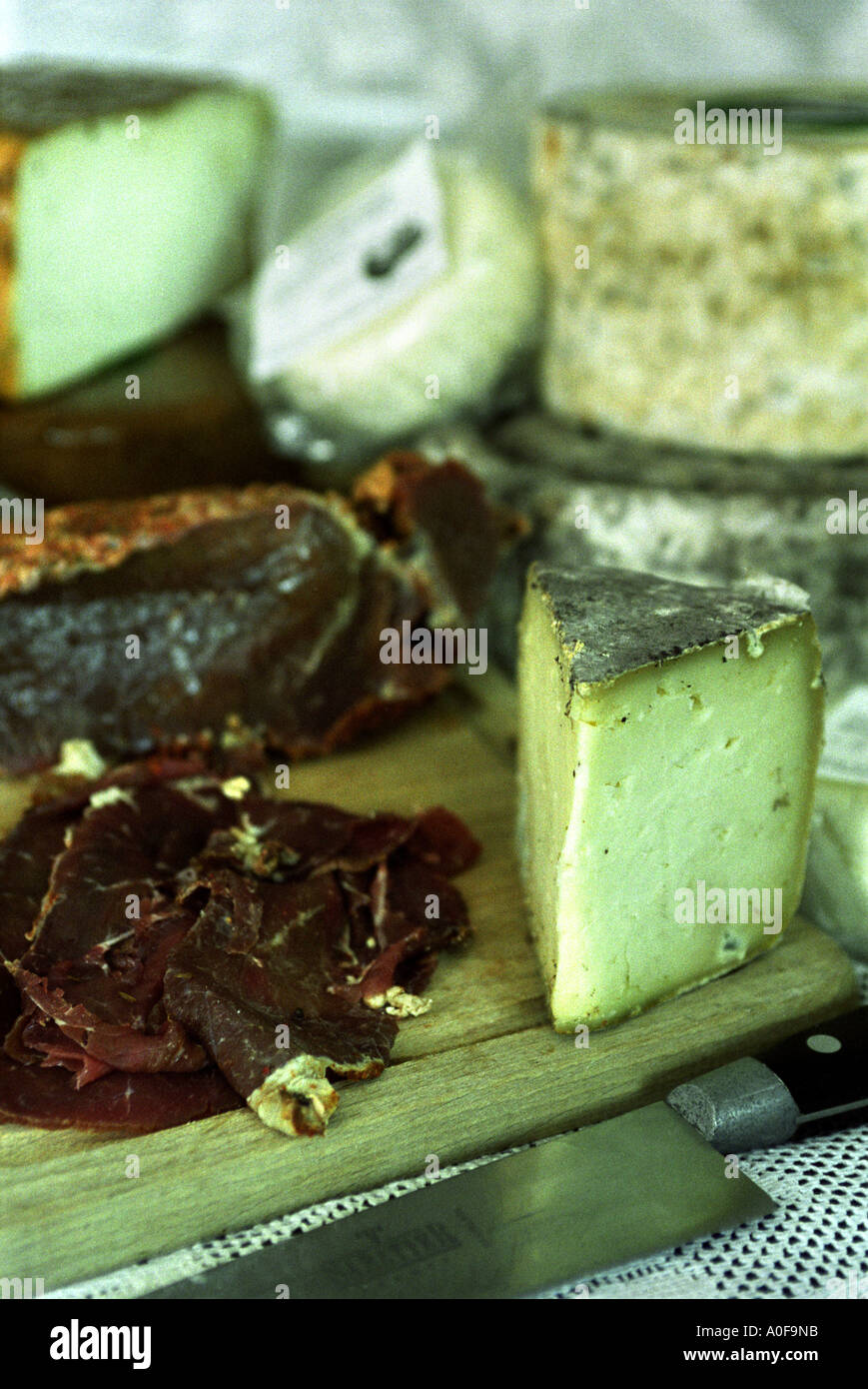 A SLICE OF JUNAS CHEESE AND OTHER PRODUCTS INCLUDING PASTRAMI IAMBORS ...